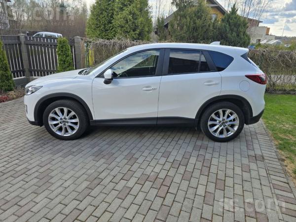 White Mazda CX-5 2014 in Riga, with an engine capacity of 2.20 L and mileage of 205 thousand km for 7950 €, photo 4 on AUTOMOTO.COM.LV