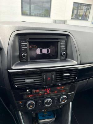 White Mazda CX-5 2014 in Marijampole, with an engine capacity of 2.19 L and mileage of 180 thousand km for 5200 €, photo 7 on AUTOMOTO.COM.LV