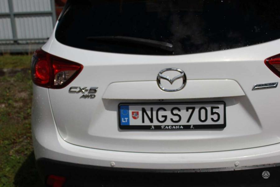 White Mazda CX-5 2014 in Panevezys, with an engine capacity of 2.19 L and mileage of 238 thousand km for 7500 €, photo 13 on AUTOMOTO.COM.LV