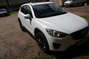 White Mazda CX-5 2014 in Panevezys, with an engine capacity of 2.19 L and mileage of 238 thousand km for 7500 €, photo 15 on AUTOMOTO.COM.LV