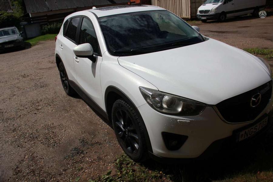 White Mazda CX-5 2014 in Panevezys, with an engine capacity of 2.19 L and mileage of 238 thousand km for 7500 €, photo 15 on AUTOMOTO.COM.LV