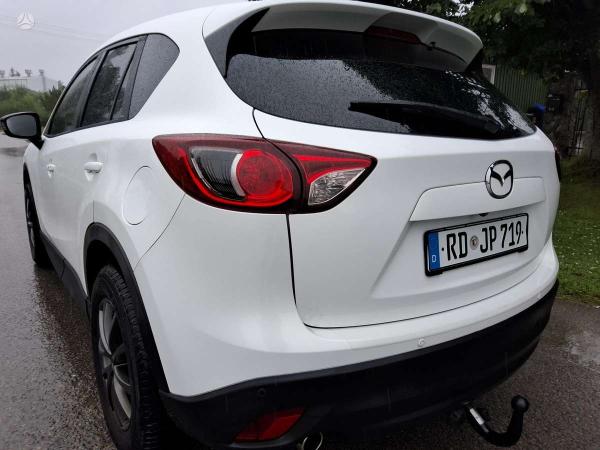 White Mazda CX-5 2014 in Plunge, with an engine capacity of 2.19 L and mileage of 179 thousand km for 6600 €, photo 2 on AUTOMOTO.COM.LV