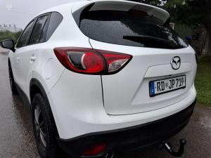 White Mazda CX-5 2014 in Plunge, with an engine capacity of 2.19 L and mileage of 179 thousand km for 6600 €, photo 3 on AUTOMOTO.COM.LV