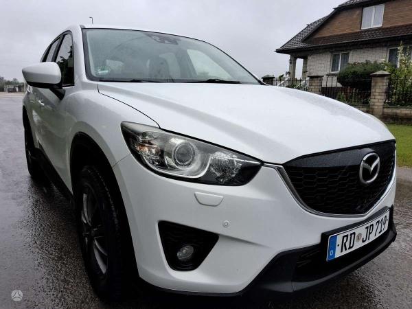 White Mazda CX-5 2014 in Plunge, with an engine capacity of 2.19 L and mileage of 179 thousand km for 6600 €, photo 3 on AUTOMOTO.COM.LV