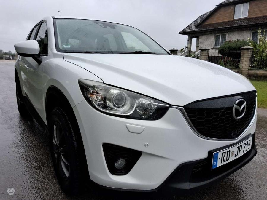 White Mazda CX-5 2014 in Plunge, with an engine capacity of 2.19 L and mileage of 179 thousand km for 6600 €, photo 4 on AUTOMOTO.COM.LV