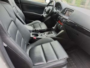 White Mazda CX-5 2014 in Plunge, with an engine capacity of 2.19 L and mileage of 179 thousand km for 6600 €, photo 7 on AUTOMOTO.COM.LV