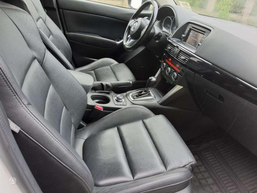 White Mazda CX-5 2014 in Plunge, with an engine capacity of 2.19 L and mileage of 179 thousand km for 6600 €, photo 7 on AUTOMOTO.COM.LV