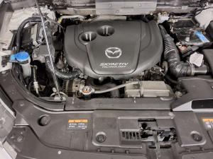 White Mazda CX-5 2014 in Plunge, with an engine capacity of 2.19 L and mileage of 179 thousand km for 6600 €, photo 13 on AUTOMOTO.COM.LV