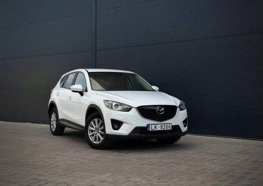 White Mazda CX-5 2014 in Riga, with an engine capacity of 2.20 L and mileage of 296 thousand km for 6495 €, photo 5 on AUTOMOTO.COM.LV