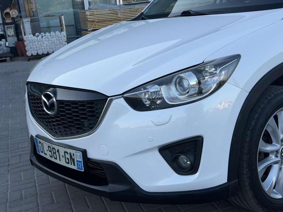 White Mazda CX-5 2014 in Taurage, with an engine capacity of 2.19 L and mileage of 250 thousand km for 6700 €, photo 3 on AUTOMOTO.COM.LV