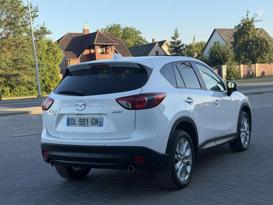 White Mazda CX-5 2014 in Taurage, with an engine capacity of 2.19 L and mileage of 250 thousand km for 6700 €, photo 9 on AUTOMOTO.COM.LV