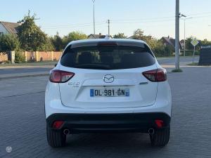 White Mazda CX-5 2014 in Taurage, with an engine capacity of 2.19 L and mileage of 250 thousand km for 6700 €, photo 10 on AUTOMOTO.COM.LV