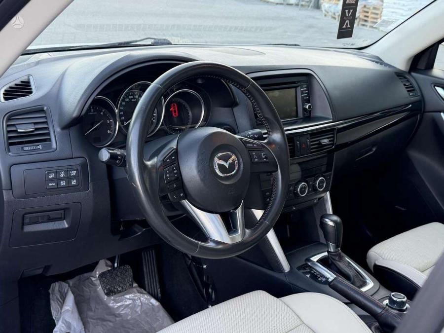 White Mazda CX-5 2014 in Taurage, with an engine capacity of 2.19 L and mileage of 250 thousand km for 6700 €, photo 16 on AUTOMOTO.COM.LV