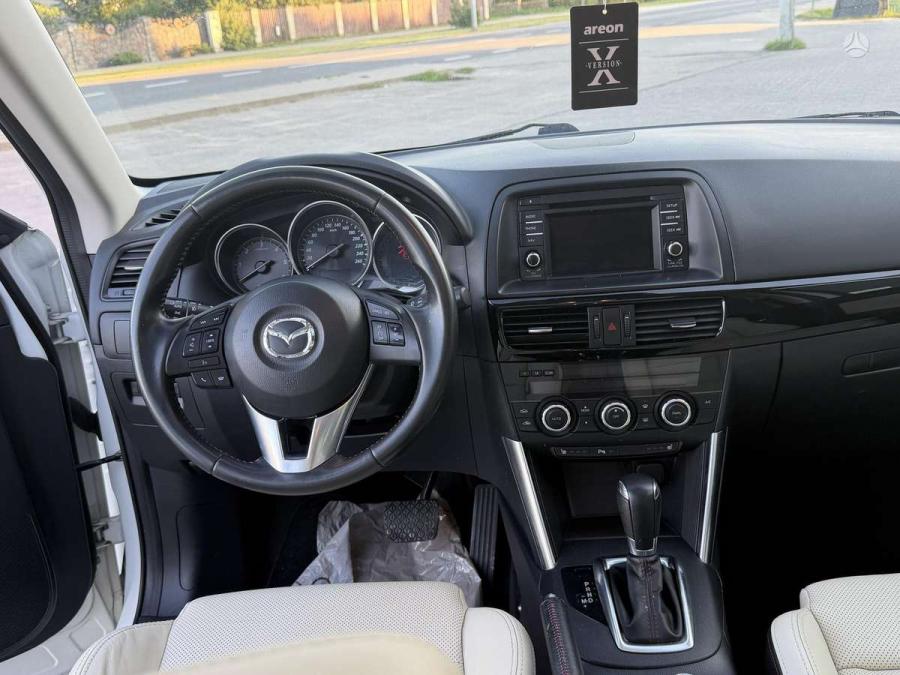 White Mazda CX-5 2014 in Taurage, with an engine capacity of 2.19 L and mileage of 250 thousand km for 6700 €, photo 18 on AUTOMOTO.COM.LV