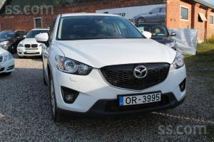 Белый Мазда СХ-5 2014 в Даугавпилс, объемом двигателя 2.20 л и пробегом 266 тыс. км за 7190 €, фото  на AUTOMOTO.COM.LV