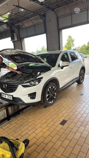 White Mazda CX-5 2015 in Panevezys, with an engine capacity of 2.19 L and mileage of 208 thousand km for 8300 €, photo 3 on AUTOMOTO.COM.LV