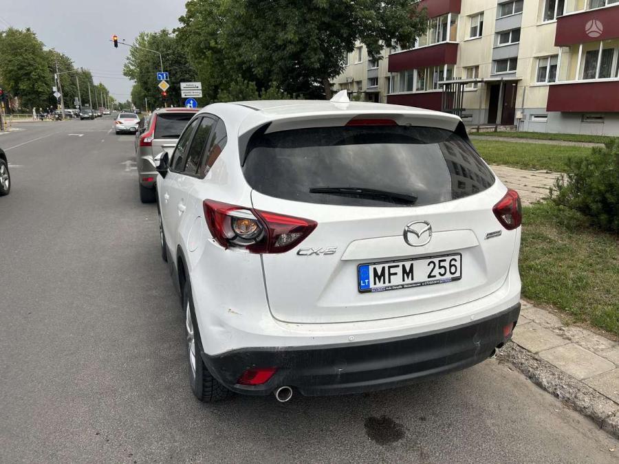 White Mazda CX-5 2015 in Panevezys, with an engine capacity of 2.19 L and mileage of 208 thousand km for 8300 €, photo 4 on AUTOMOTO.COM.LV