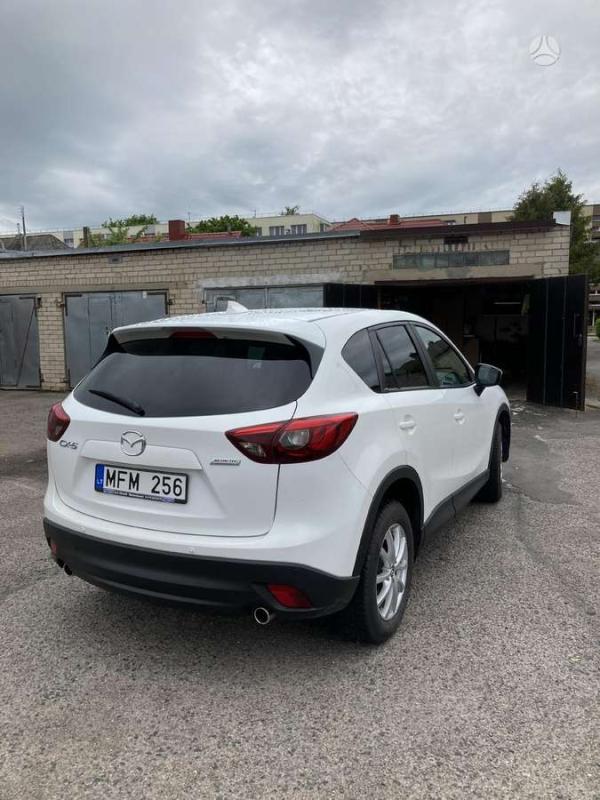 White Mazda CX-5 2015 in Panevezys, with an engine capacity of 2.19 L and mileage of 208 thousand km for 8300 €, photo 8 on AUTOMOTO.COM.LV