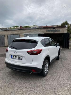 White Mazda CX-5 2015 in Panevezys, with an engine capacity of 2.19 L and mileage of 208 thousand km for 8300 €, photo 8 on AUTOMOTO.COM.LV