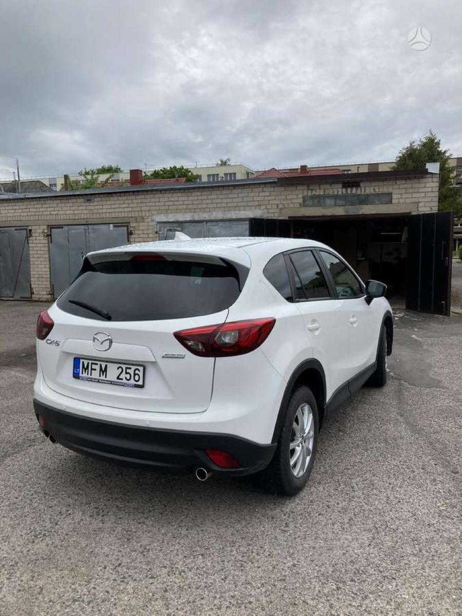White Mazda CX-5 2015 in Panevezys, with an engine capacity of 2.19 L and mileage of 208 thousand km for 8300 €, photo 8 on AUTOMOTO.COM.LV