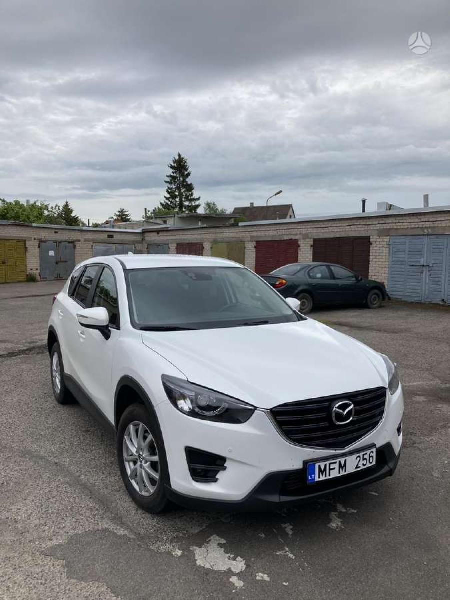 White Mazda CX-5 2015 in Panevezys, with an engine capacity of 2.19 L and mileage of 208 thousand km for 8300 €, photo 10 on AUTOMOTO.COM.LV