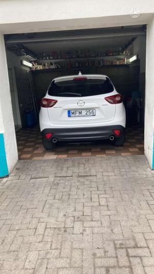 White Mazda CX-5 2015 in Panevezys, with an engine capacity of 2.19 L and mileage of 208 thousand km for 8300 €, photo 18 on AUTOMOTO.COM.LV