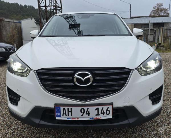 White Mazda CX-5 2015 in Kaunas, with an engine capacity of 2.19 L and mileage of 245 thousand km for 6990 €, photo 2 on AUTOMOTO.COM.LV