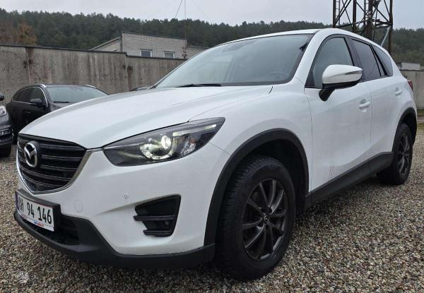 White Mazda CX-5 2015 in Kaunas, with an engine capacity of 2.19 L and mileage of 245 thousand km for 6990 €, photo 3 on AUTOMOTO.COM.LV