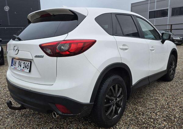 White Mazda CX-5 2015 in Kaunas, with an engine capacity of 2.19 L and mileage of 245 thousand km for 6990 €, photo 6 on AUTOMOTO.COM.LV