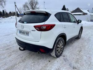White Mazda CX-5 2015 in Taurage, with an engine capacity of 2.19 L and mileage of 230 thousand km for 6300 €, photo 6 on AUTOMOTO.COM.LV