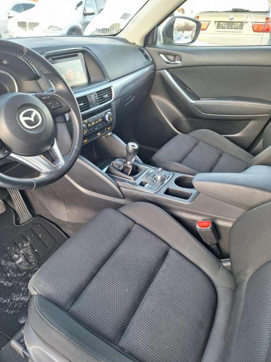 White Mazda CX-5 2015 in Taurage, with an engine capacity of 2.19 L and mileage of 255 thousand km for 7400 €, photo 12 on AUTOMOTO.COM.LV