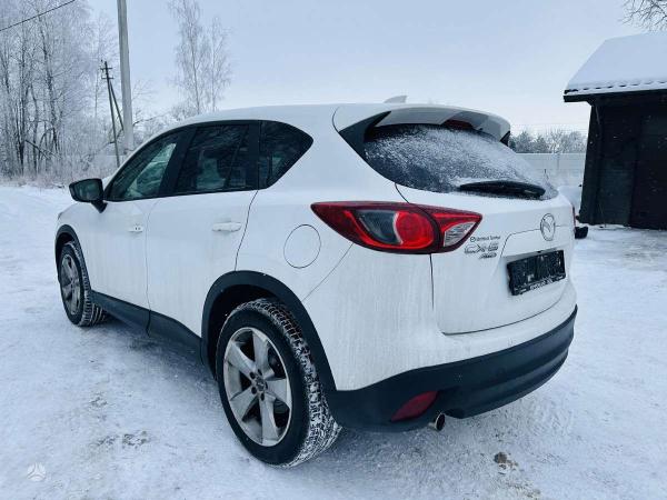 White Mazda CX-5 2015 in Kaunas, with an engine capacity of 2.20 L and mileage of 190 thousand km for 6550 €, photo 4 on AUTOMOTO.COM.LV