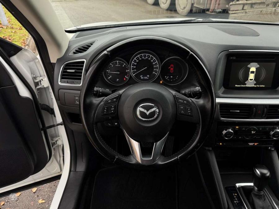 White Mazda CX-5 2015 in Taurage, with an engine capacity of 2.19 L and mileage of 182 thousand km for 8900 €, photo 9 on AUTOMOTO.COM.LV
