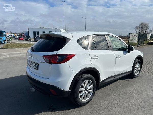 White Mazda CX-5 2015 in Klaipeda, with an engine capacity of 2.20 L and mileage of 220 thousand km for 7500 €, photo 3 on AUTOMOTO.COM.LV