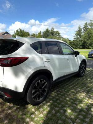 White Mazda CX-5 2015 in Mazeikiai, with an engine capacity of 2.19 L and mileage of 239 thousand km for 10600 €, photo 5 on AUTOMOTO.COM.LV