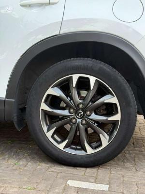 White Mazda CX-5 2015 in Mazeikiai, with an engine capacity of 2.19 L and mileage of 239 thousand km for 10600 €, photo 12 on AUTOMOTO.COM.LV