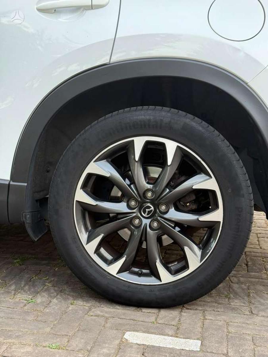 White Mazda CX-5 2015 in Mazeikiai, with an engine capacity of 2.19 L and mileage of 239 thousand km for 10600 €, photo 12 on AUTOMOTO.COM.LV