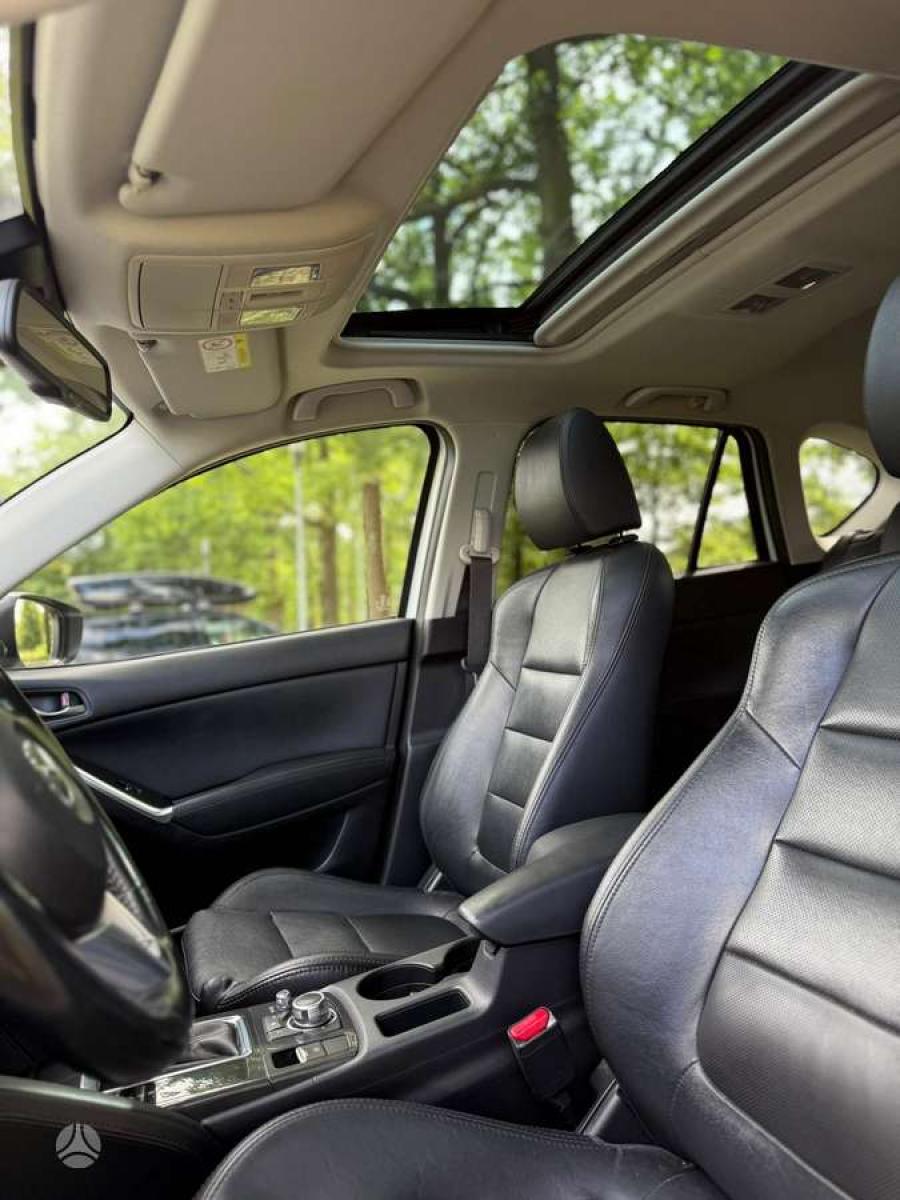 White Mazda CX-5 2015 in Mazeikiai, with an engine capacity of 2.19 L and mileage of 239 thousand km for 10600 €, photo 14 on AUTOMOTO.COM.LV