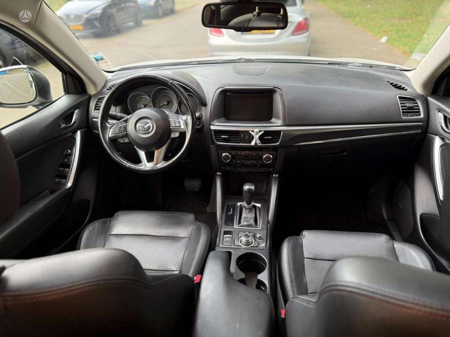 White Mazda CX-5 2015 in Mazeikiai, with an engine capacity of 2.19 L and mileage of 239 thousand km for 10600 €, photo 17 on AUTOMOTO.COM.LV