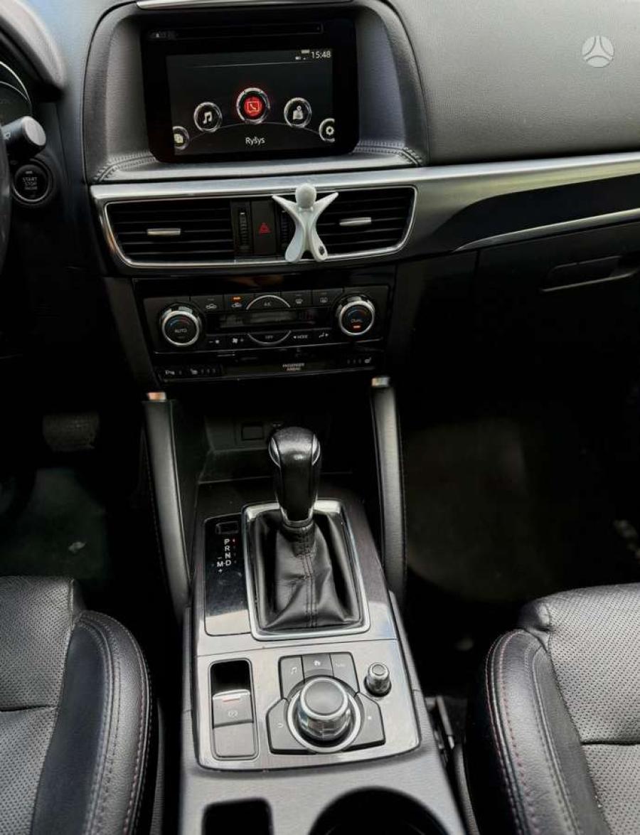 White Mazda CX-5 2015 in Mazeikiai, with an engine capacity of 2.19 L and mileage of 239 thousand km for 10600 €, photo 18 on AUTOMOTO.COM.LV
