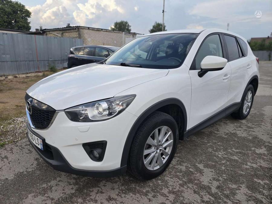White Mazda CX-5 2015 in Taurage, with an engine capacity of 2.19 L and mileage of 232 thousand km for 6900 €, photo 4 on AUTOMOTO.COM.LV