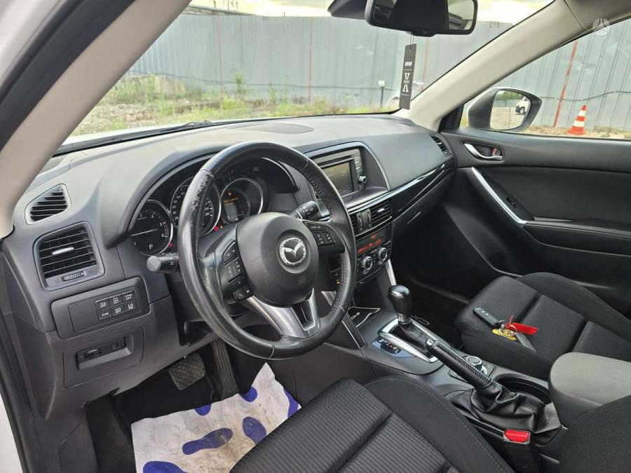 White Mazda CX-5 2015 in Taurage, with an engine capacity of 2.19 L and mileage of 232 thousand km for 6900 €, photo 11 on AUTOMOTO.COM.LV