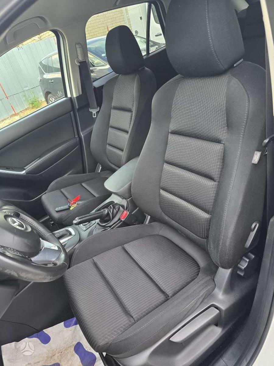 White Mazda CX-5 2015 in Taurage, with an engine capacity of 2.19 L and mileage of 232 thousand km for 6900 €, photo 12 on AUTOMOTO.COM.LV