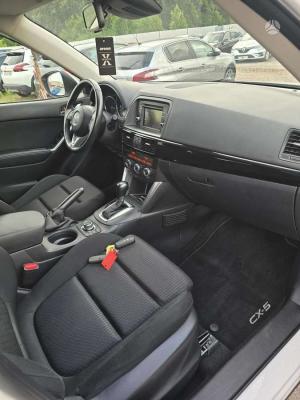 White Mazda CX-5 2015 in Taurage, with an engine capacity of 2.19 L and mileage of 232 thousand km for 6900 €, photo 20 on AUTOMOTO.COM.LV