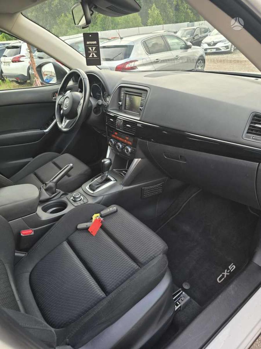 White Mazda CX-5 2015 in Taurage, with an engine capacity of 2.19 L and mileage of 232 thousand km for 6900 €, photo 20 on AUTOMOTO.COM.LV