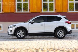 White Mazda CX-5 2015 in Riga, with an engine capacity of 2.20 L and mileage of 240 thousand km for 7650 €, photo 4 on AUTOMOTO.COM.LV