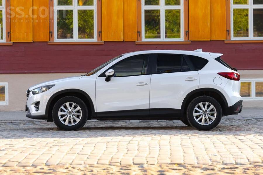 White Mazda CX-5 2015 in Riga, with an engine capacity of 2.20 L and mileage of 240 thousand km for 7650 €, photo 4 on AUTOMOTO.COM.LV