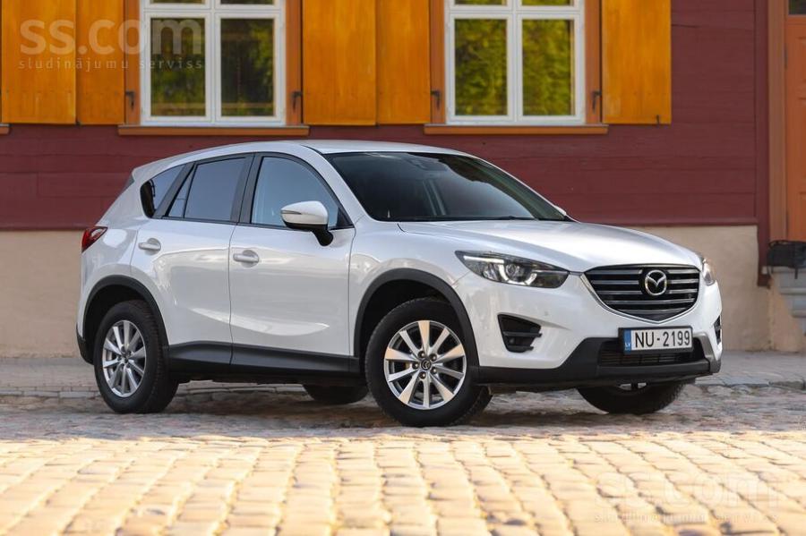 White Mazda CX-5 2015 in Riga, with an engine capacity of 2.20 L and mileage of 240 thousand km for 7650 €, photo 5 on AUTOMOTO.COM.LV