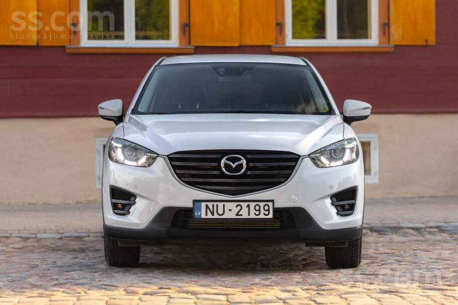 White Mazda CX-5 2015 in Riga, with an engine capacity of 2.20 L and mileage of 240 thousand km for 7650 €, photo 7 on AUTOMOTO.COM.LV