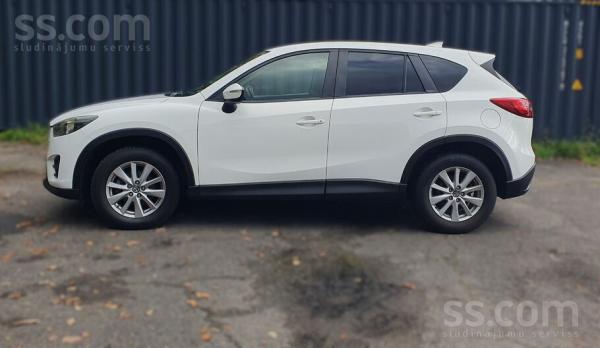 White Mazda CX-5 2015 in Riga, with an engine capacity of 2.20 L and mileage of 240 thousand km for 7950 €, photo 4 on AUTOMOTO.COM.LV